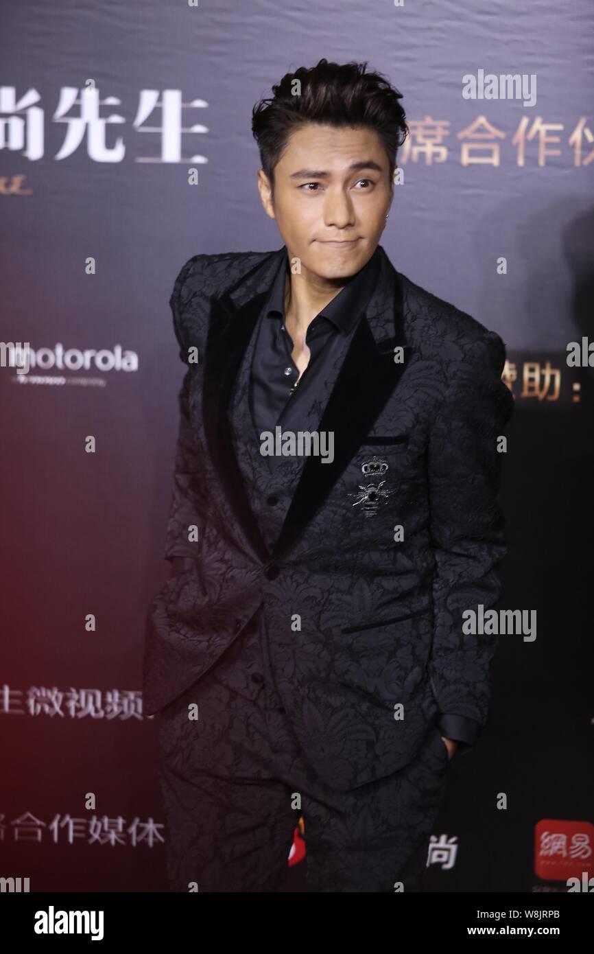 Chinese actor Chen Kun arrives on the red carpet for the Esquire Man at ...