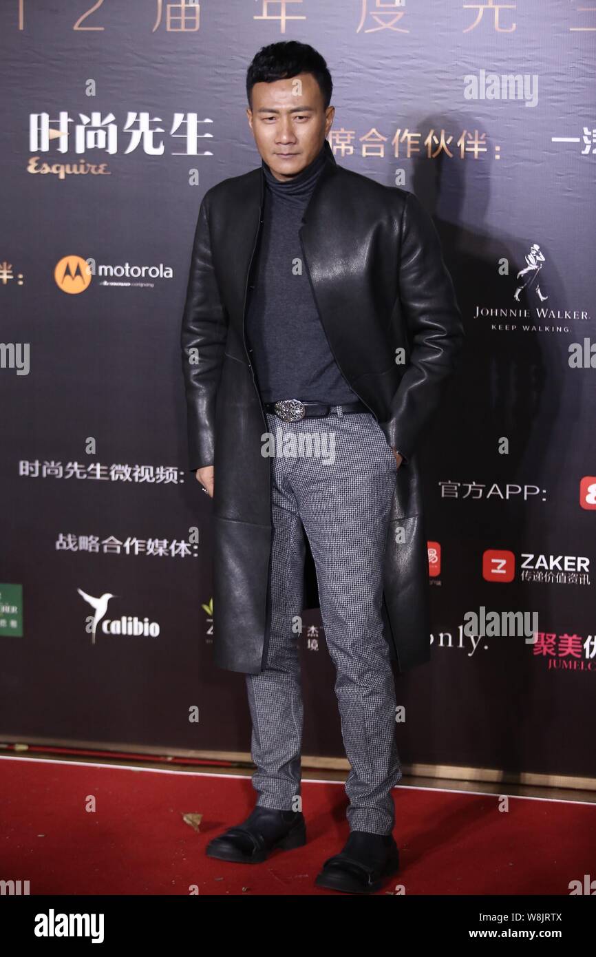 Chinese actor Hu Jun arrives on the red carpet for the Esquire Man at ...