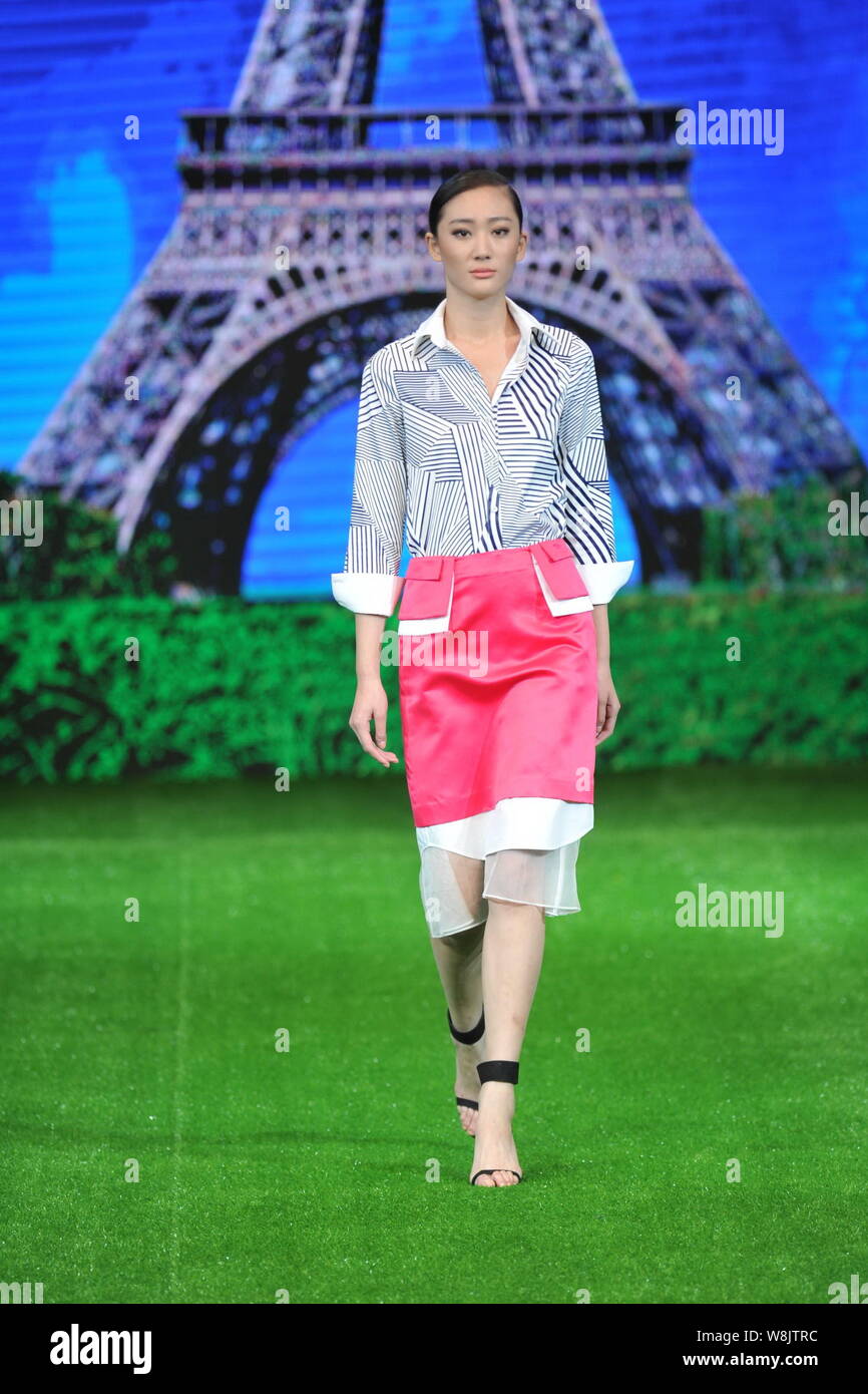 A model displays a new creation at the PLD fashion show by Chinese designer Fu Suqin during the ...