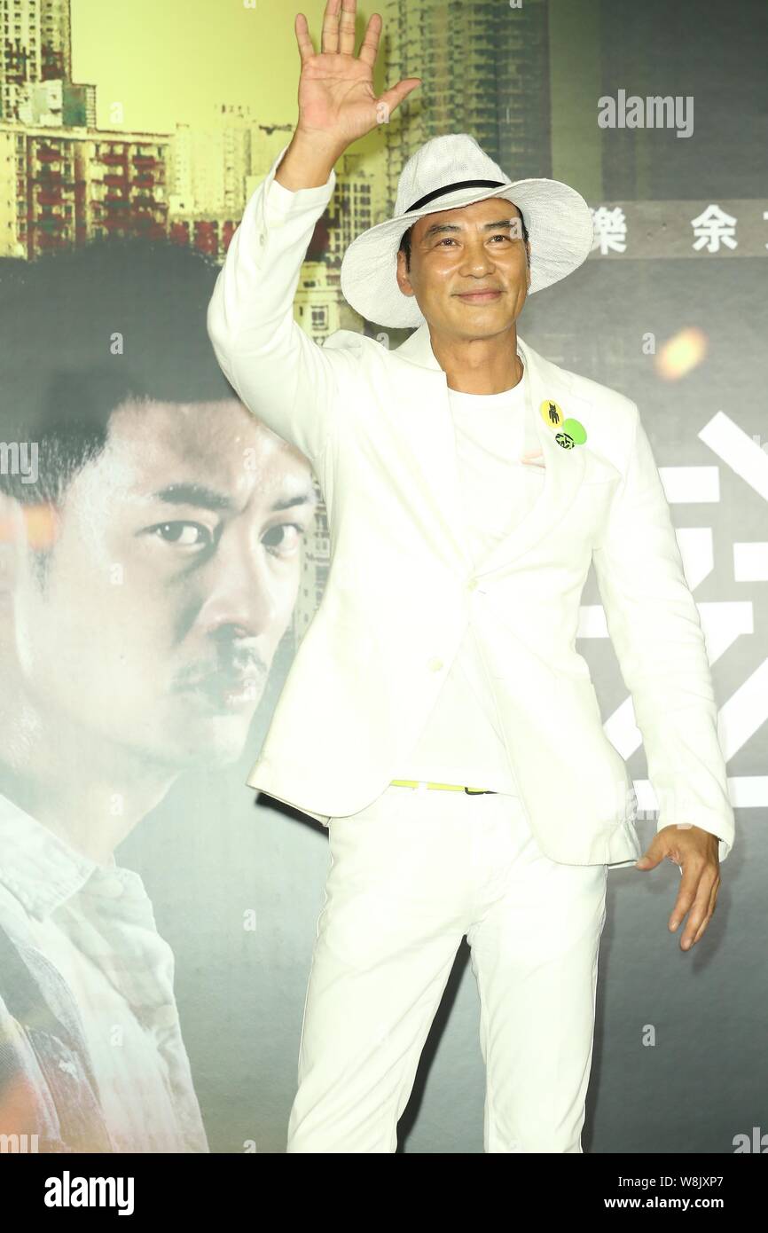 Hong Kong actor Simon Yam waves at the premiere for his movie "Wild ...
