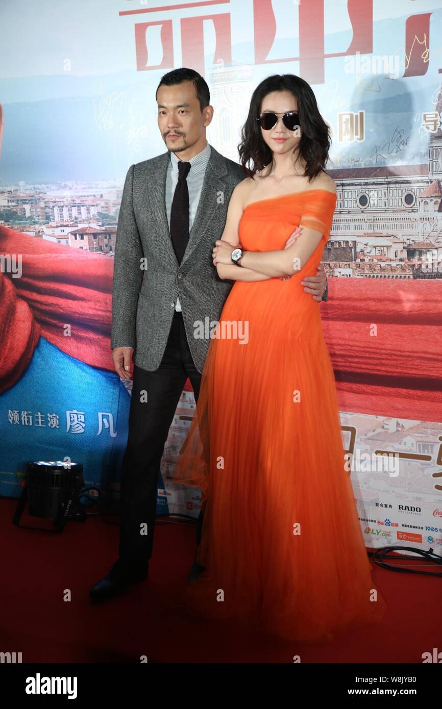 Chinese actress Tang Wei, right, and actor Liao Fan pose on the red ...