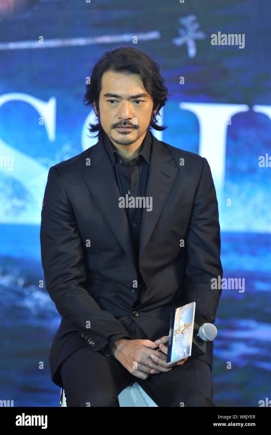 Taiwanese-Japanese actor and singer Takeshi Kaneshiro poses at a press ...