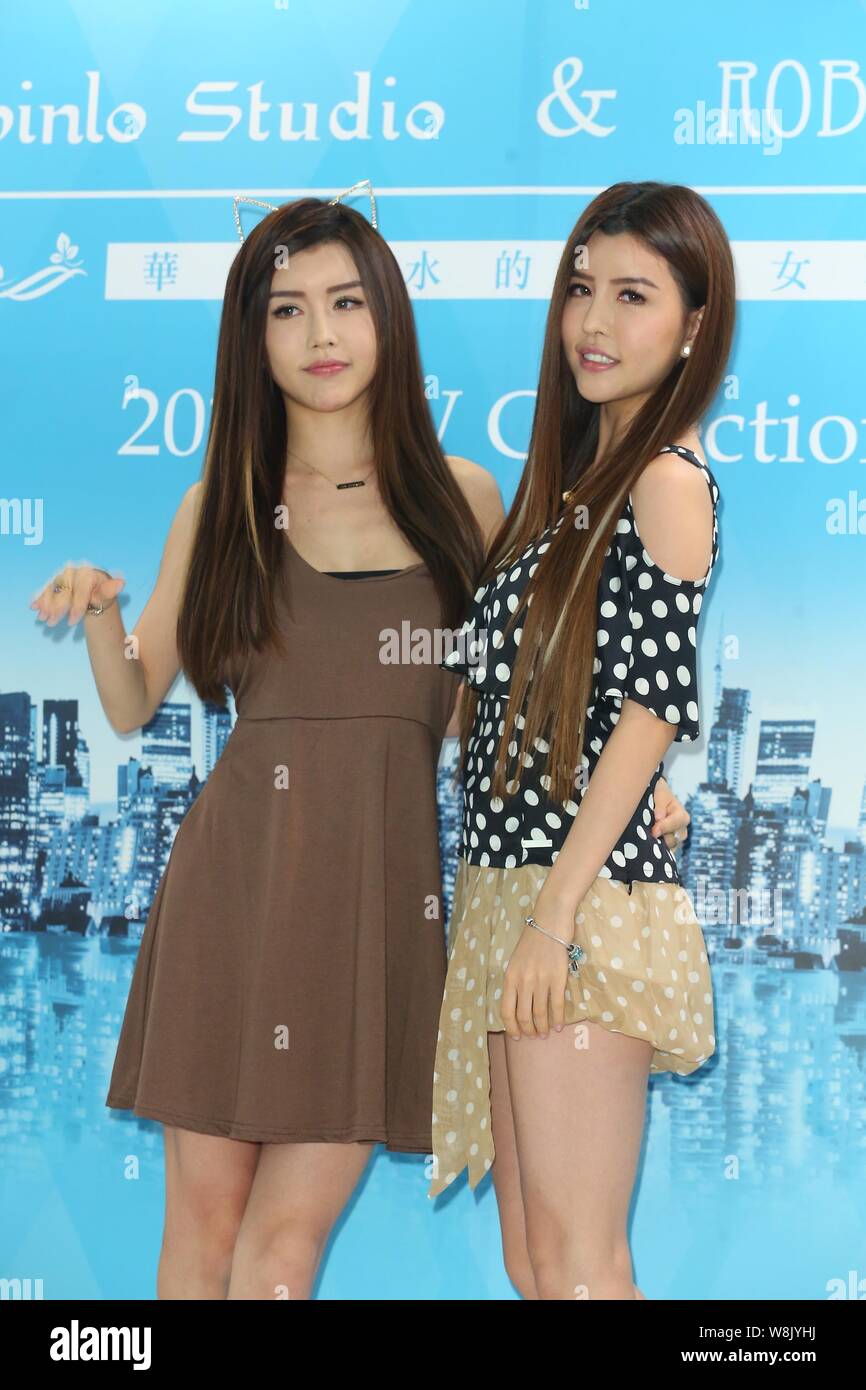 Twin sisters Miko and Yumi of Singaporean girl group By2 pose at a press conference for the ...