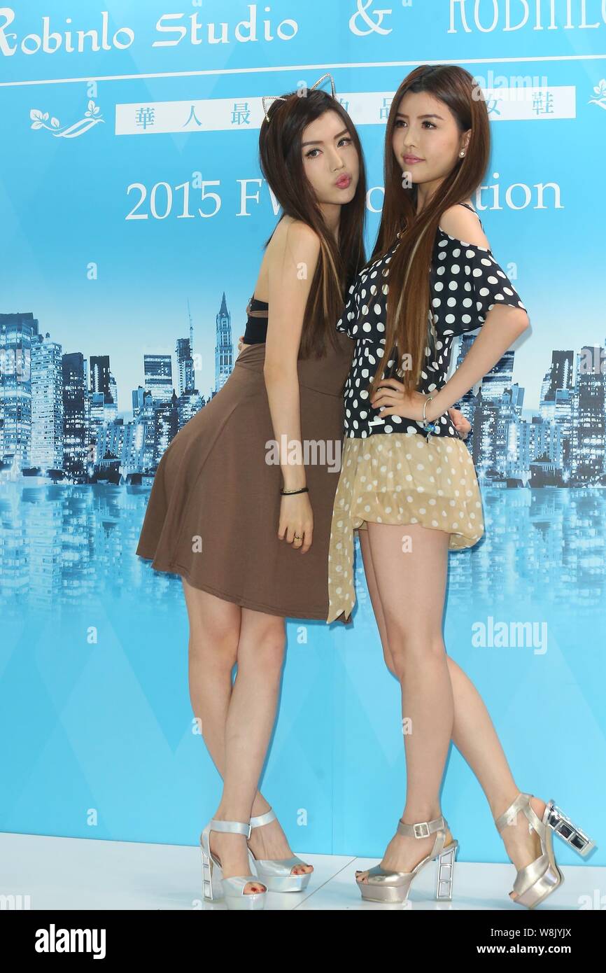 Twin sisters Miko and Yumi of Singaporean girl group By2 pose at a ...