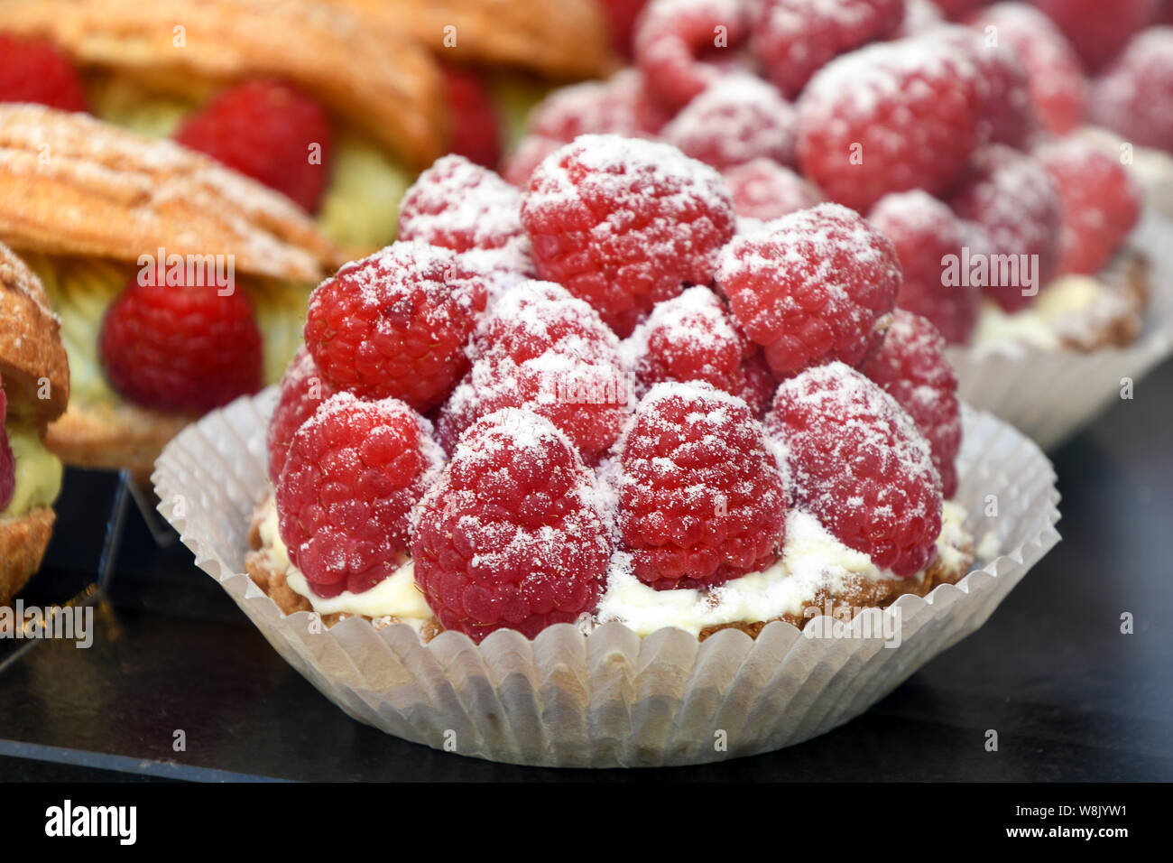 Fresh raspberry in sugar hi-res stock photography and images - Alamy