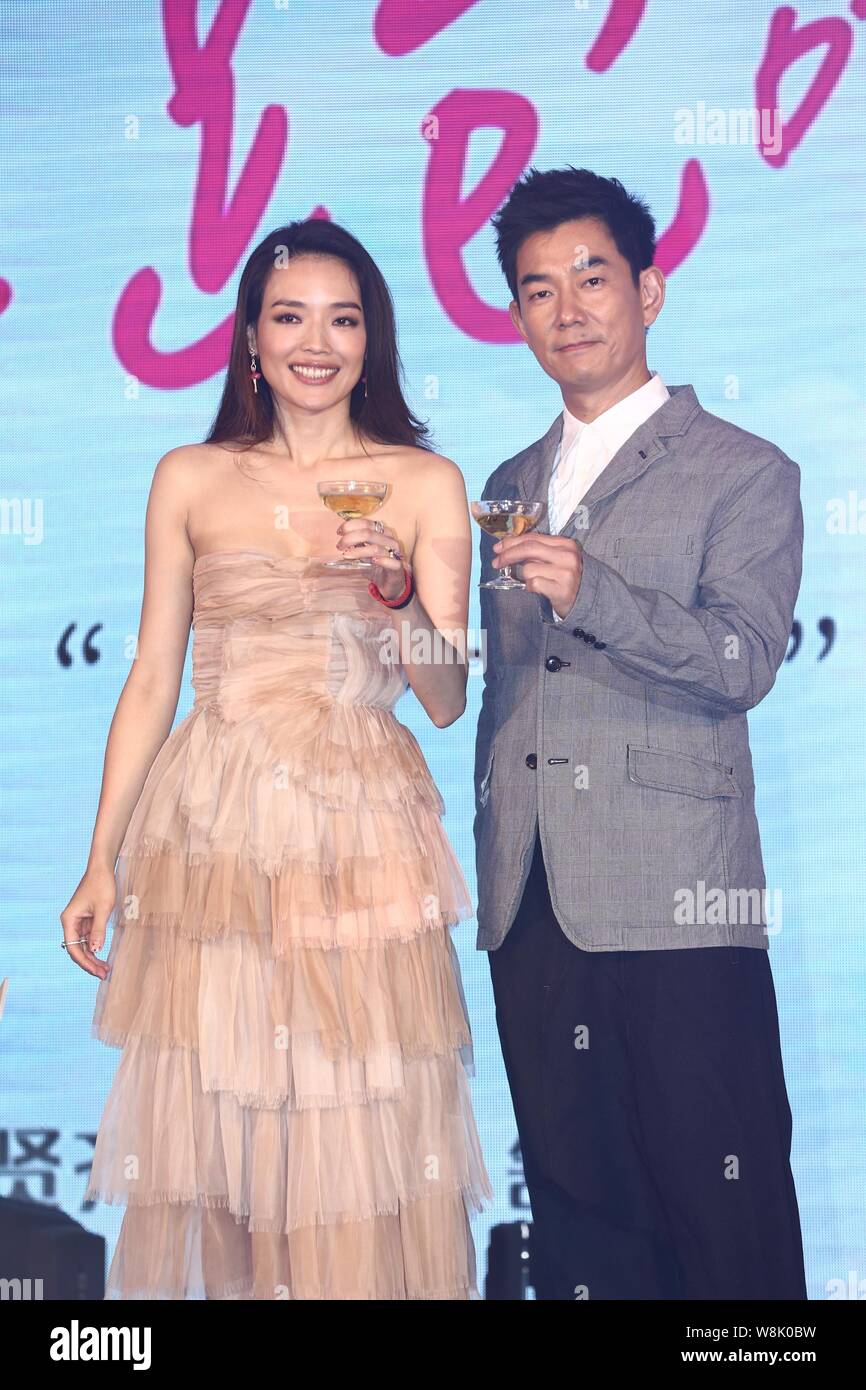Taiwanese actress Shu Qi, left, and actor Richie Jen pose during a ...