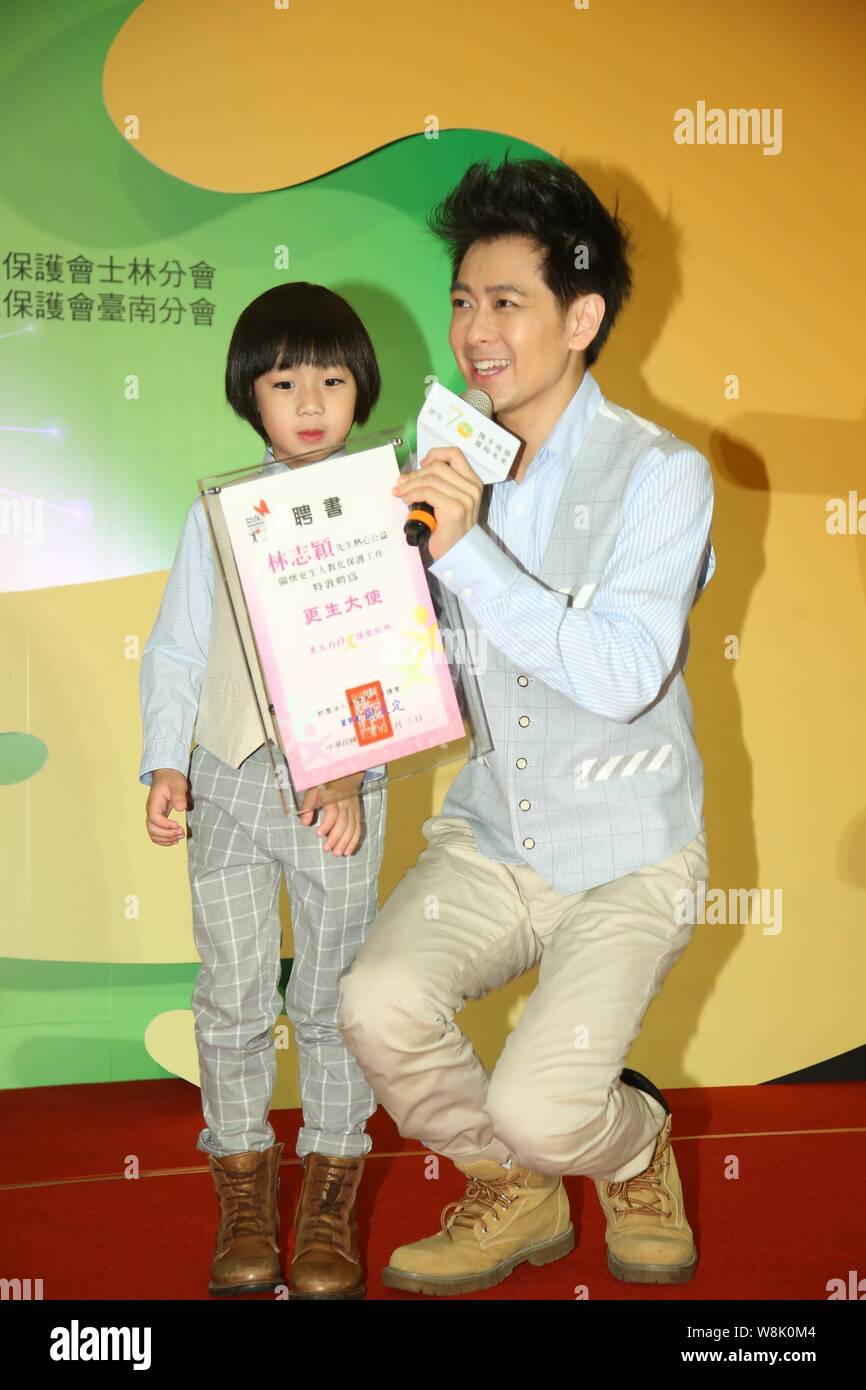 Taiwanese singer, actor and racer Jimmy Lin, right, and his son Kimi ...