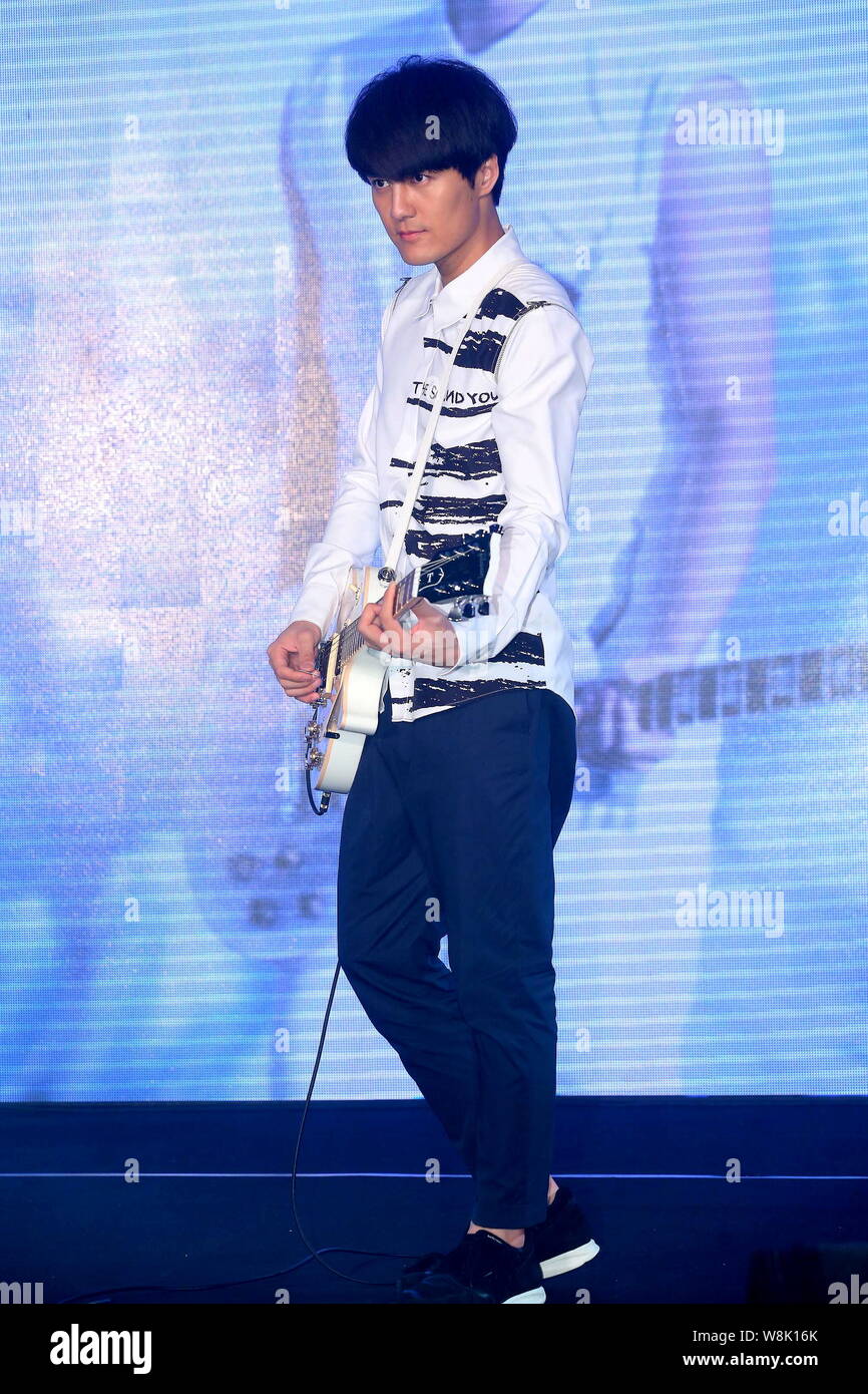 Taiwanese singer Kenji Wu performs at a press conference for his new ...