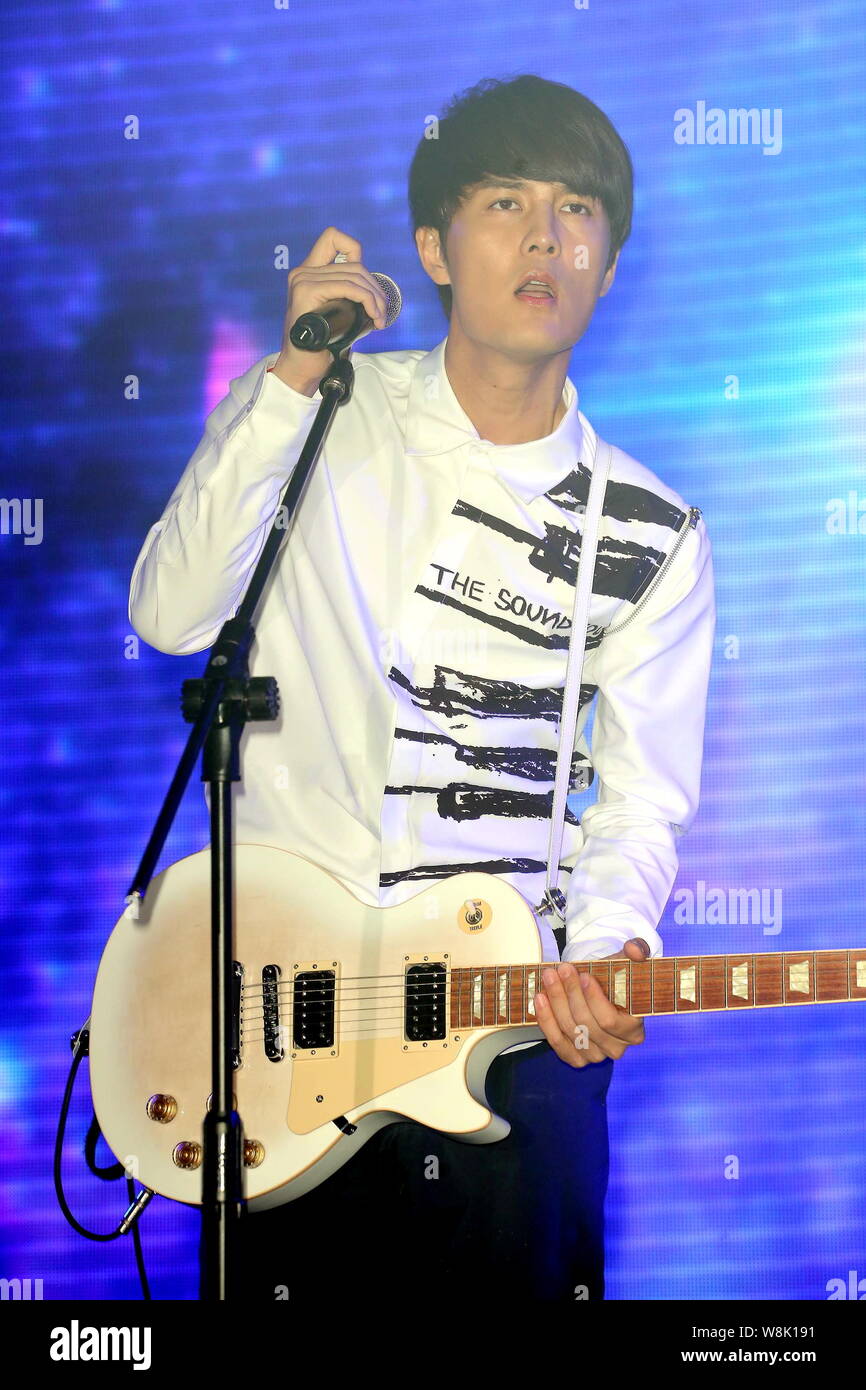 Taiwanese singer Kenji Wu performs at a press conference for his new ...