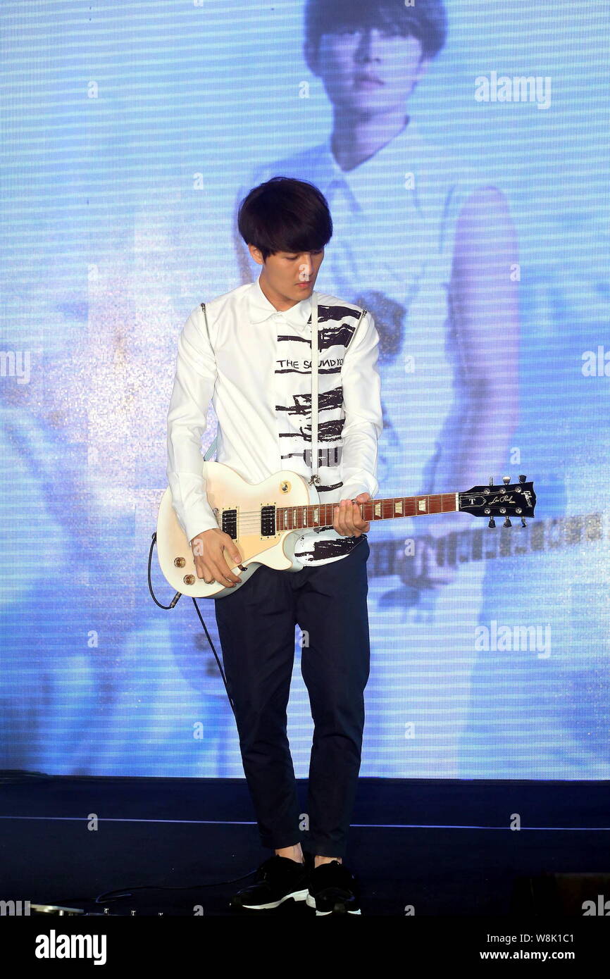 Taiwanese singer Kenji Wu performs at a press conference for his new ...