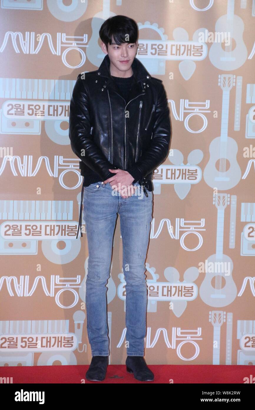 South Korean actor Kim Woo-bin poses on the red carpet as he arrives ...
