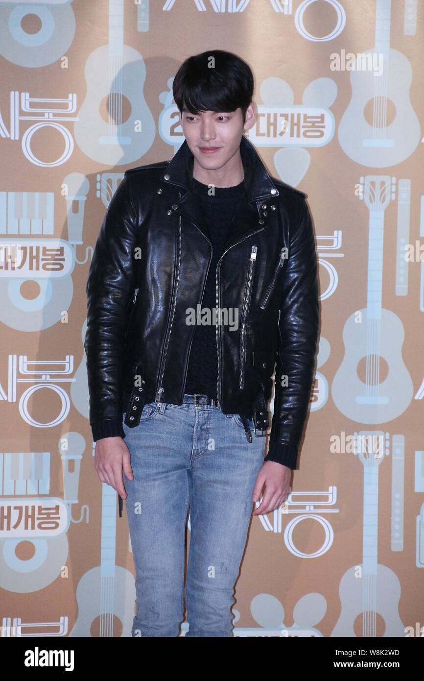South Korean actor Kim Woo-bin poses on the red carpet as he arrives ...