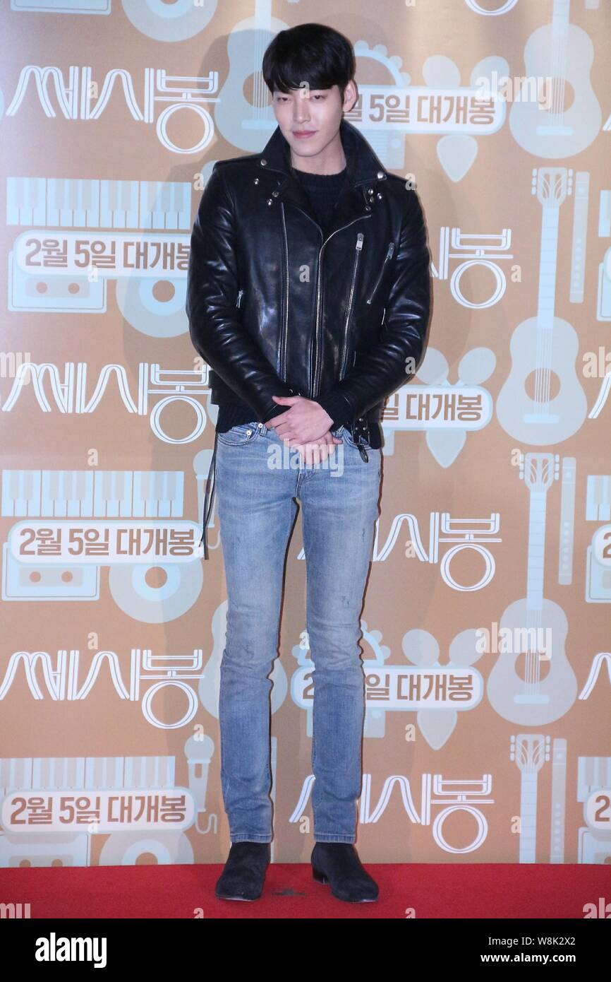 South Korean actor Kim Woo-bin poses on the red carpet as he arrives ...