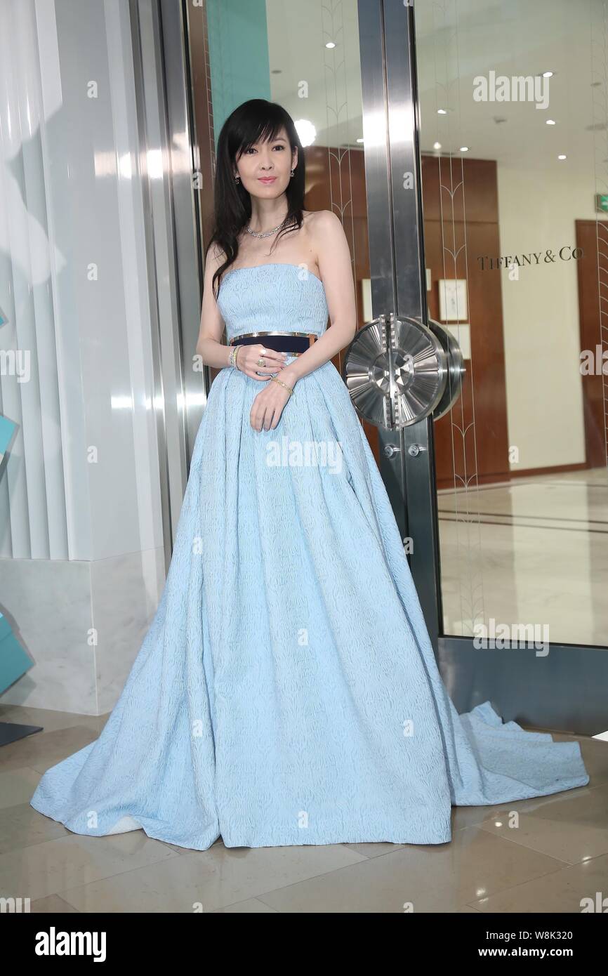 Hong Kong singer Vivian Chow poses during the reopening ceremony for ...