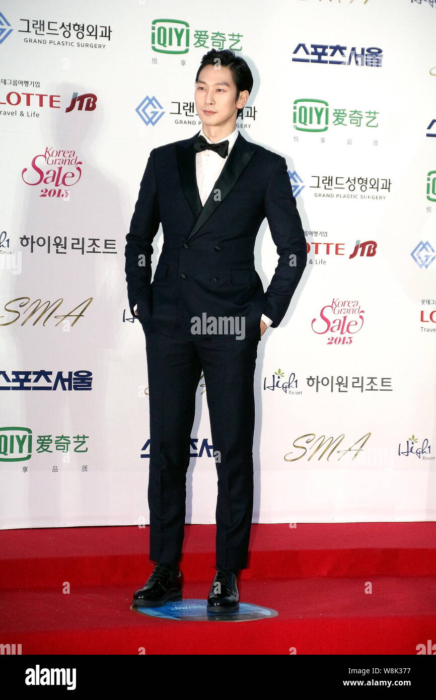 South Korean actor Sim Ji-ho poses on the red carpet as he arrives for ...