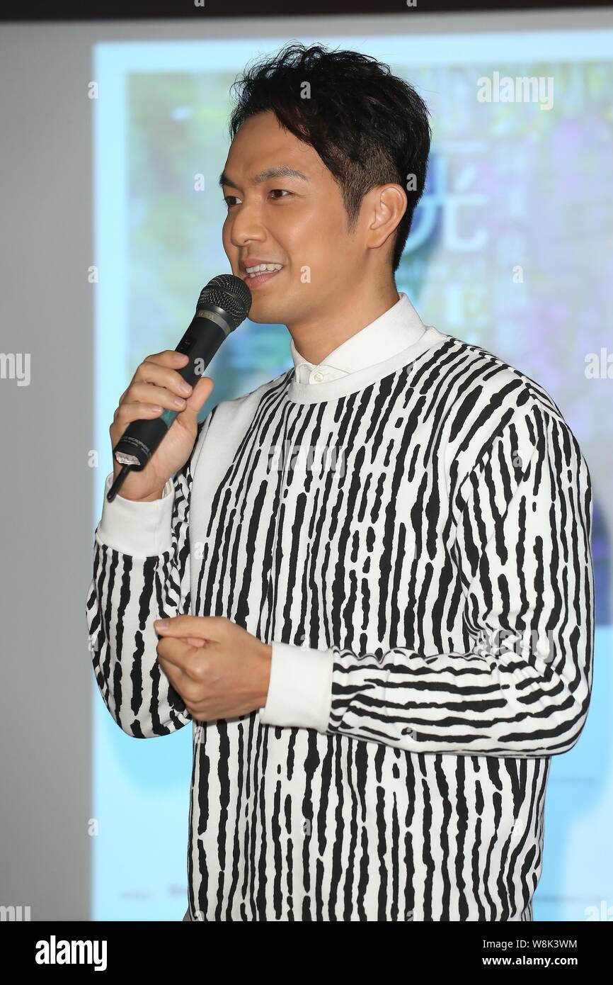 Hong Kong actor Wallace Chung speaks during his photo exhibition in ...