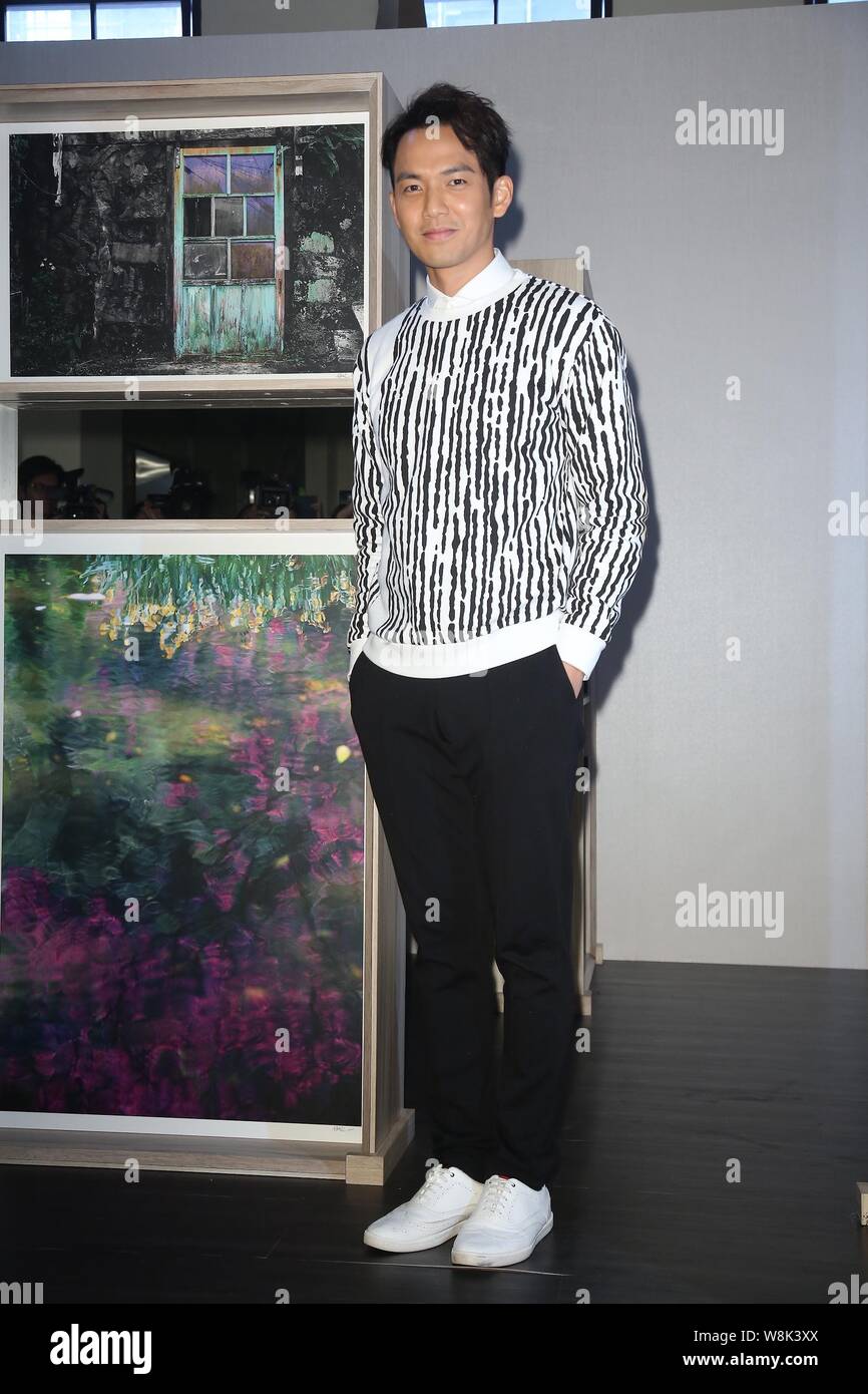 Hong Kong actor Wallace Chung poses during his photo exhibition in ...