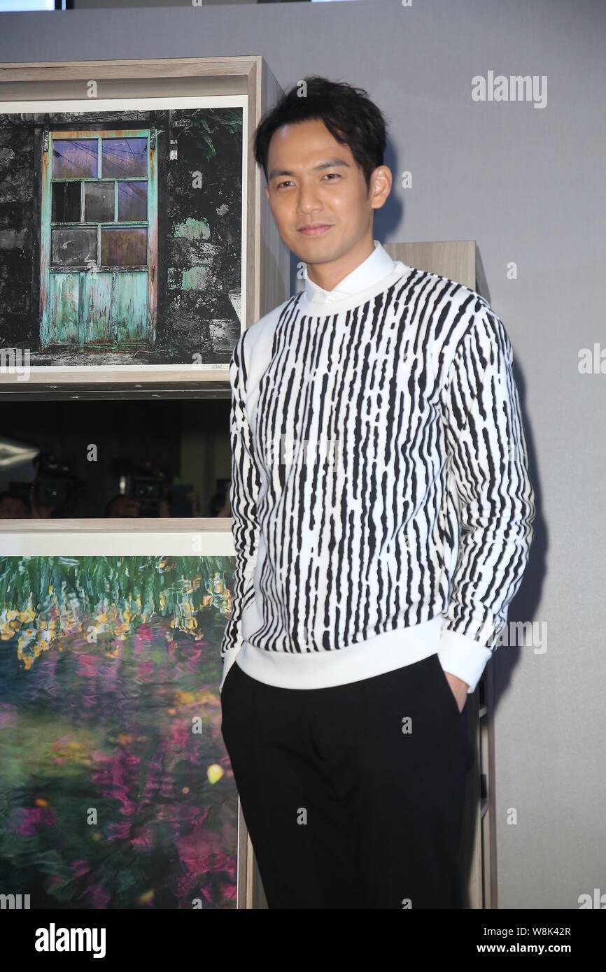 Hong Kong actor Wallace Chung poses during his photo exhibition in ...