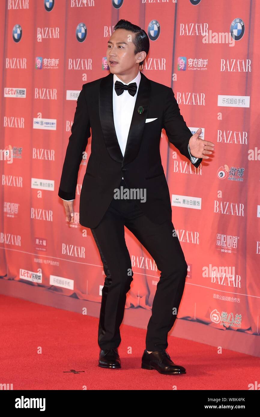 Chinese actor Deng Chao arrives on the red carpet for the 2015 Bazaar ...