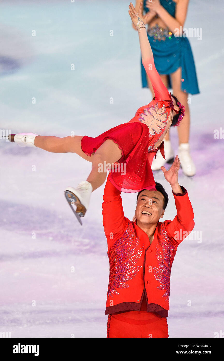 Chinese figure skating couple Shen Xue, top, and Zhao Hongbo perform at ...