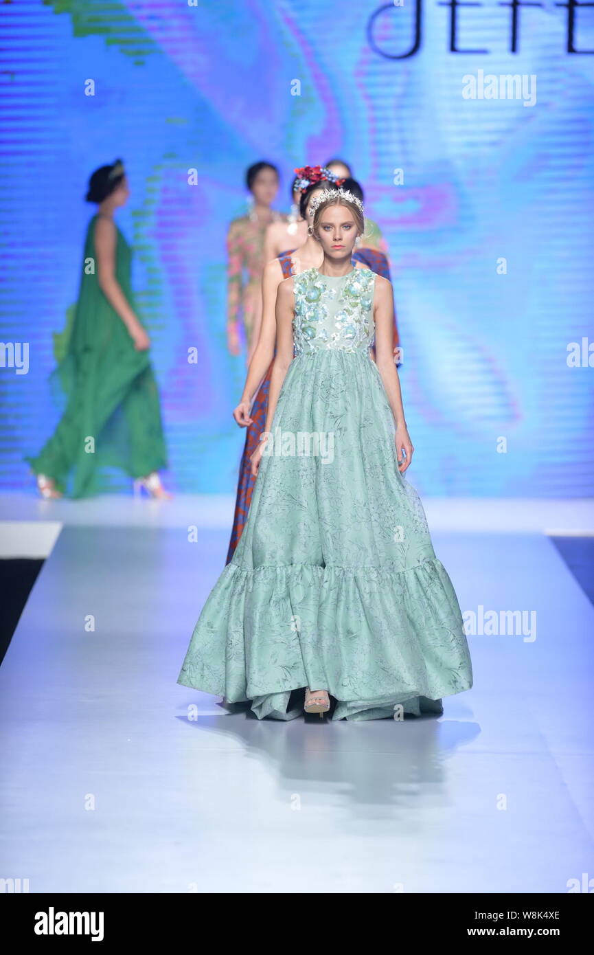 Models display new creations by Chinese designer Xie Feng at the ...