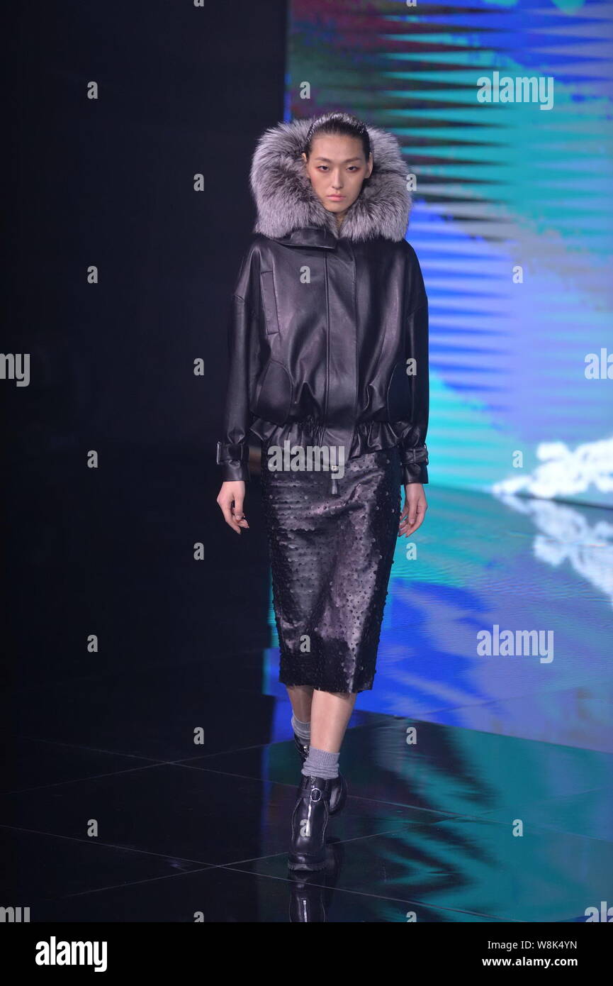 A Model Displays A New Creation By Chinese Fashion Designer Fan Ran At The Ranfan Fashion Show
