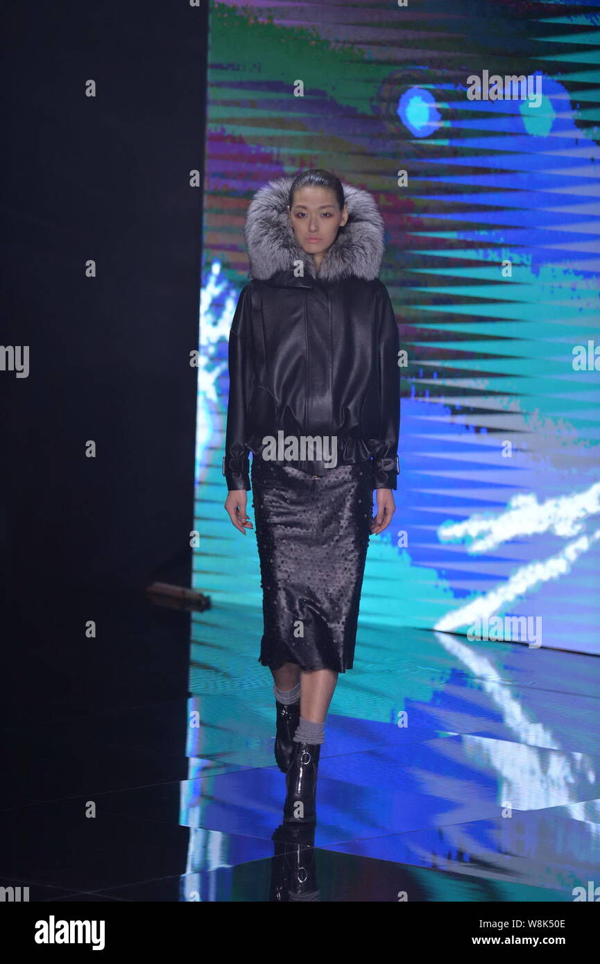 A Model Displays A New Creation By Chinese Fashion Designer Fan Ran At The Ranfan Fashion Show