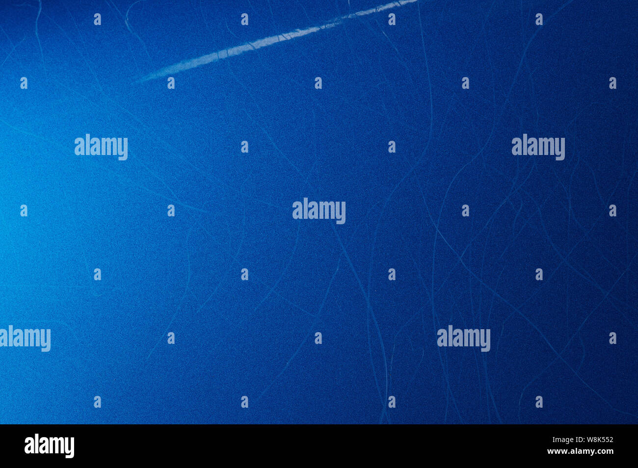 Cat claw scratches on blue paint surface close up view Stock Photo - Alamy