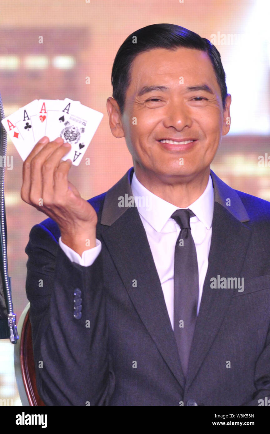 Hong Kong actor Chow Yun-fat poses at a press conference to promote his ...
