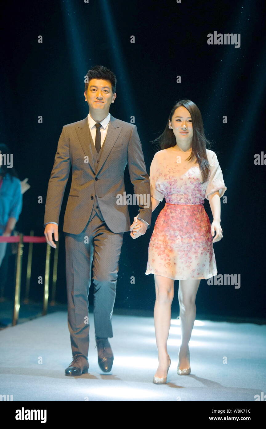 Chinese actress Huo Siyan, right, and her actor husband Du Jiang arrive ...