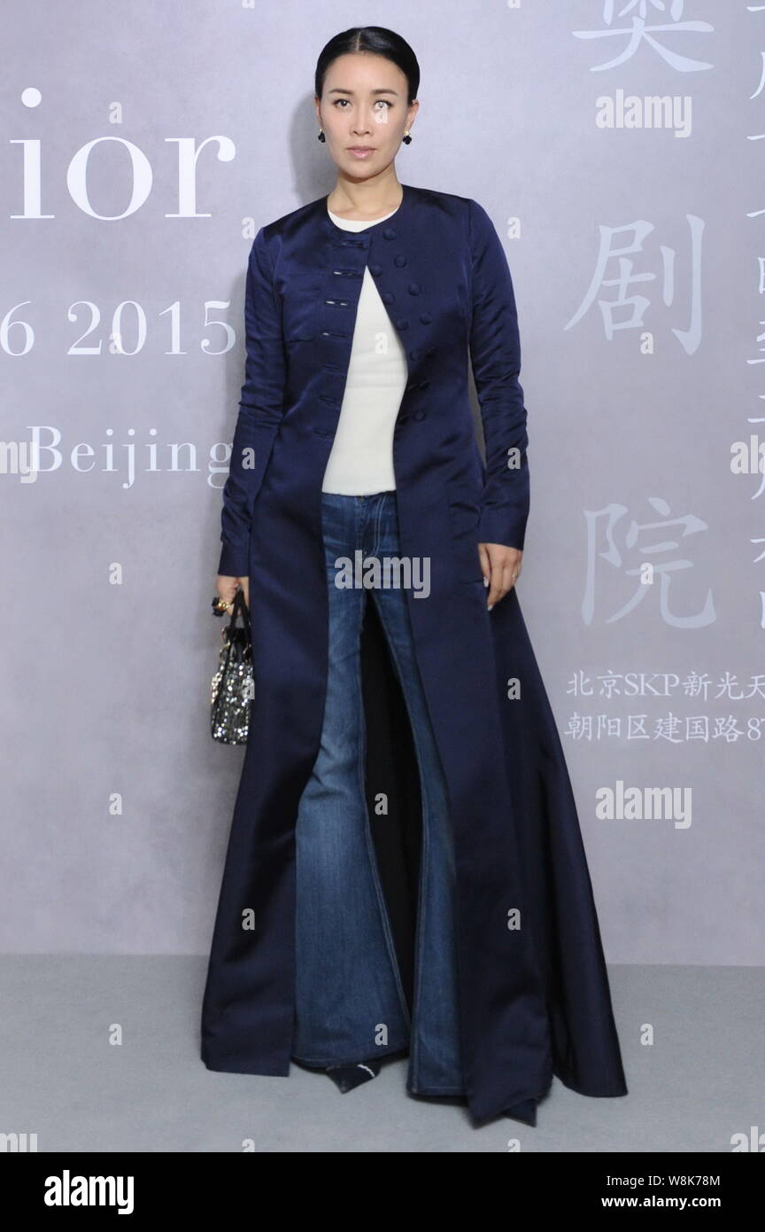 Chinese singer Na Ying poses as she arrives at the "Le Petit Theatre ...