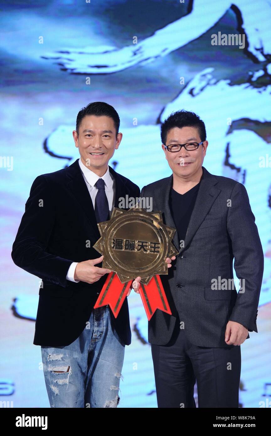 Hong Kong singer and actor Andy Lau, left, poses with Wang Zhongjun ...