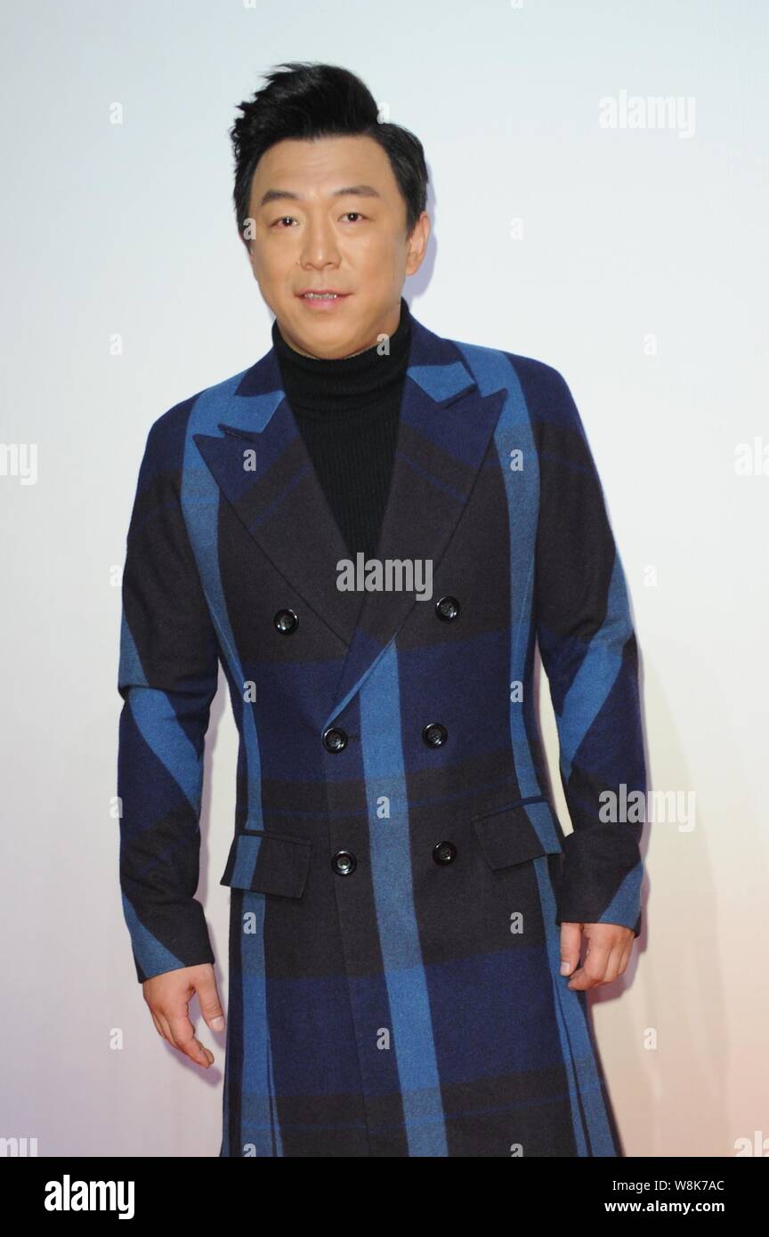 Chinese actor Huang Bo poses on the red carpet as he arrives for the ...