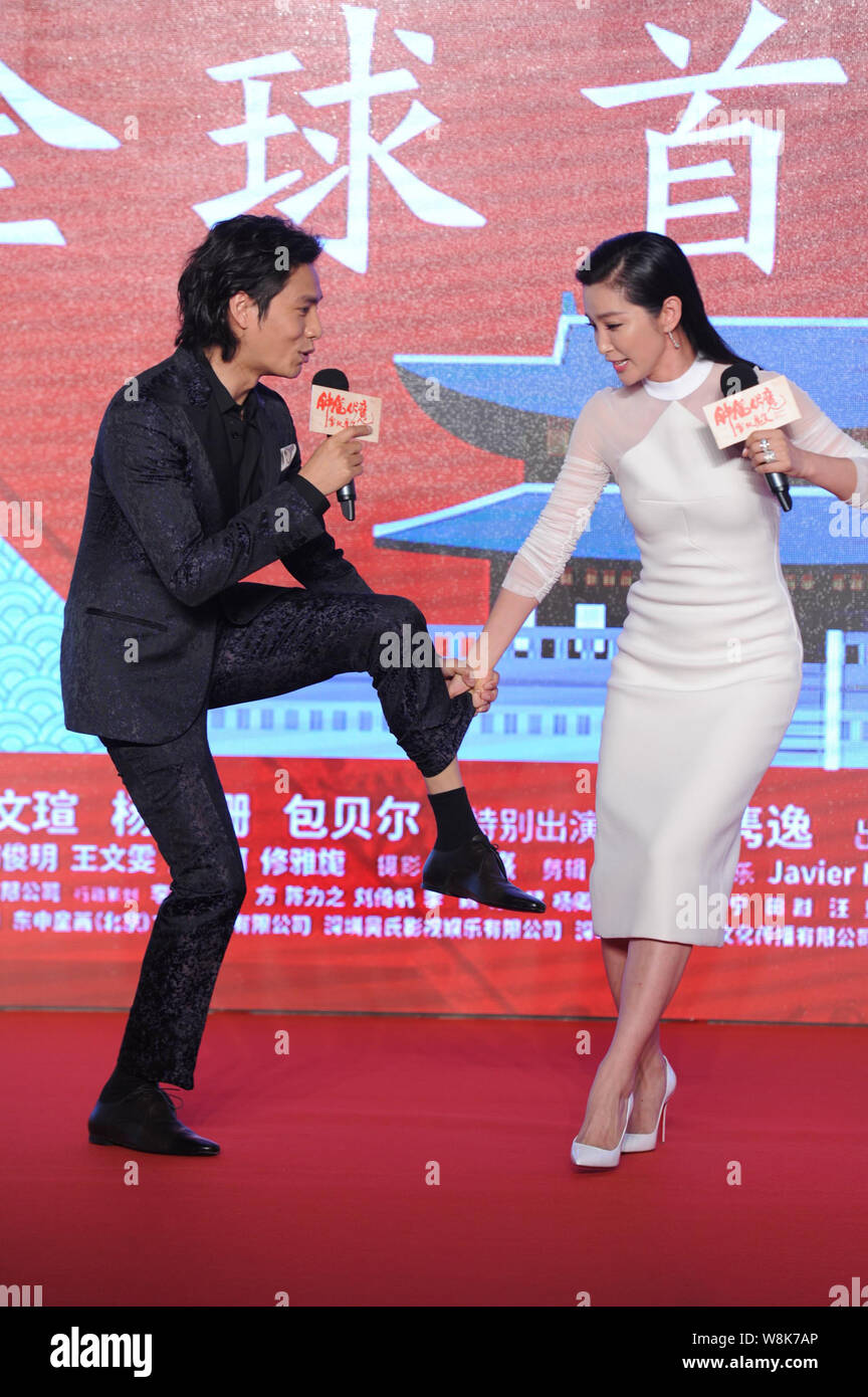Chinese actress Li Bingbing, right, interacts with actor Chen Kun ...
