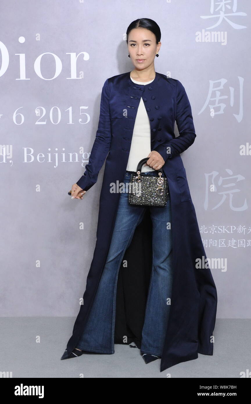 Chinese singer Na Ying poses as she arrives at the "Le Petit Theatre ...