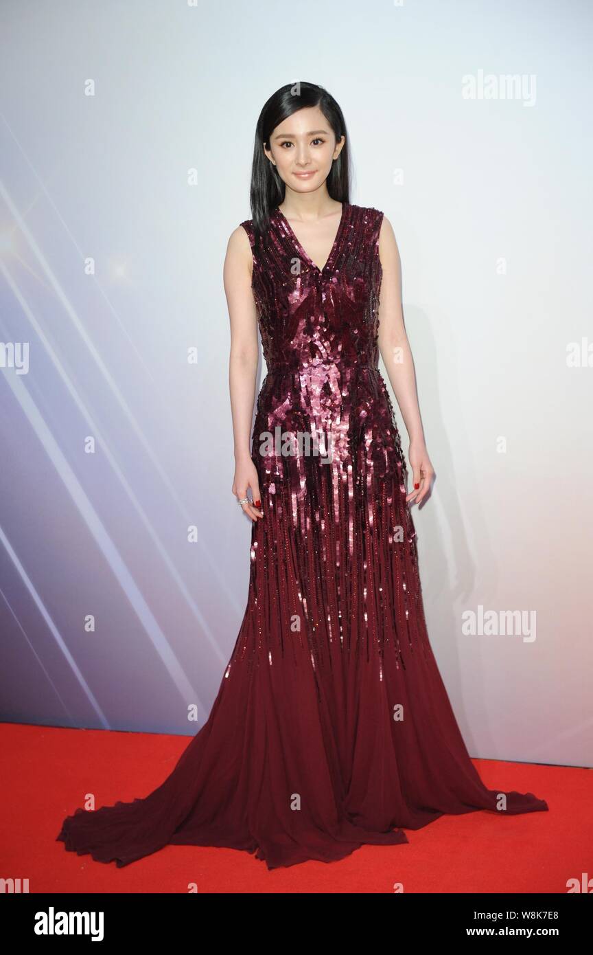 Chinese actress Yang Mi poses on the red carpet as she arrives for the ...