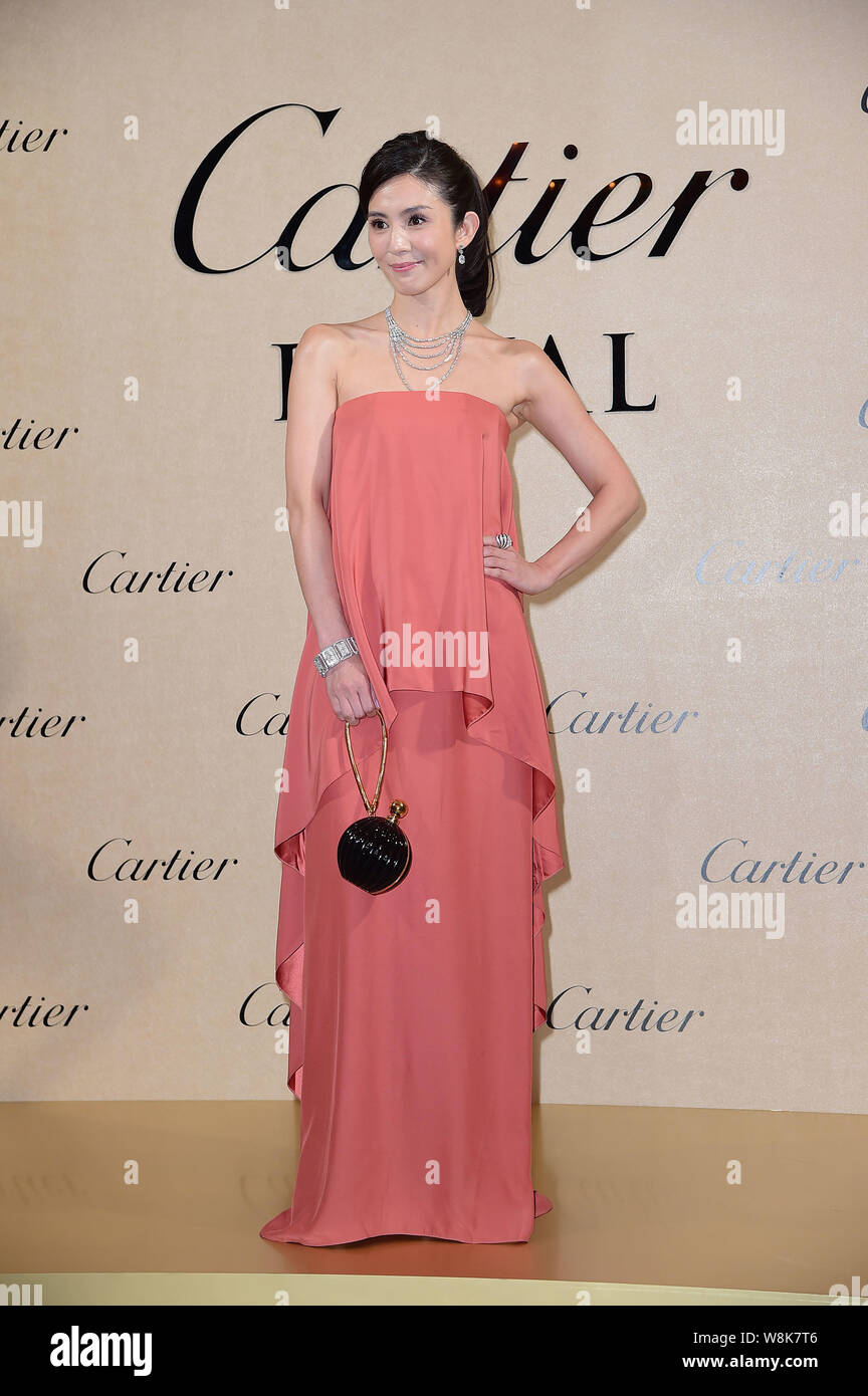 Hong Kong singer and actress Charlie Yeung poses as she arrives for a ...