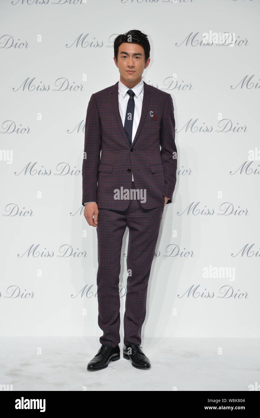 Chinese actor Lin Gengxin poses as he arrives for an opening event for ...