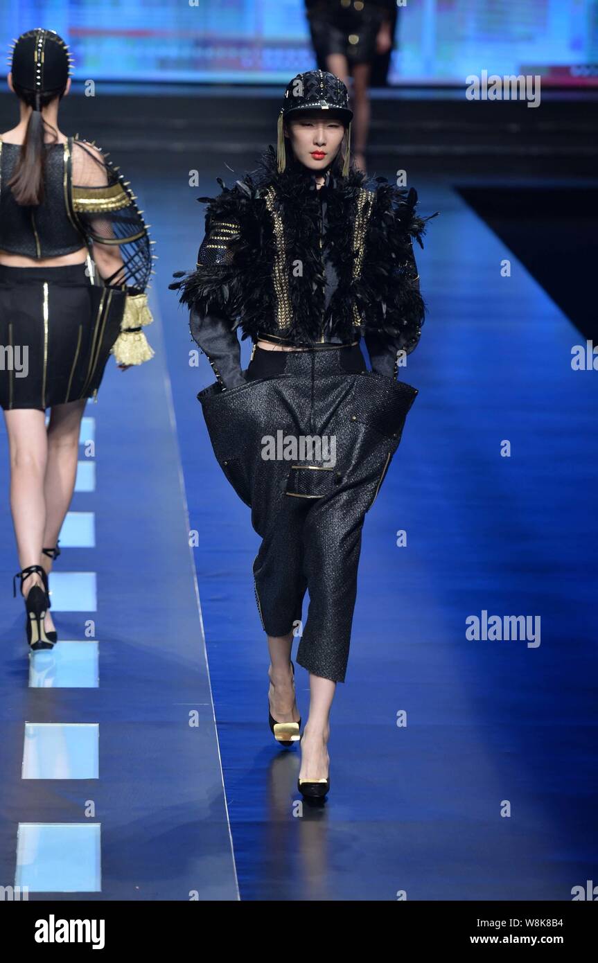 A model displays a new creation at Hempel Award - The 23rd China ...