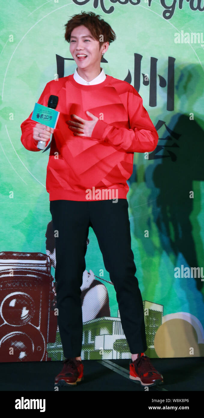 Chinese actor and singer Lu Han laughs during a press conference for ...