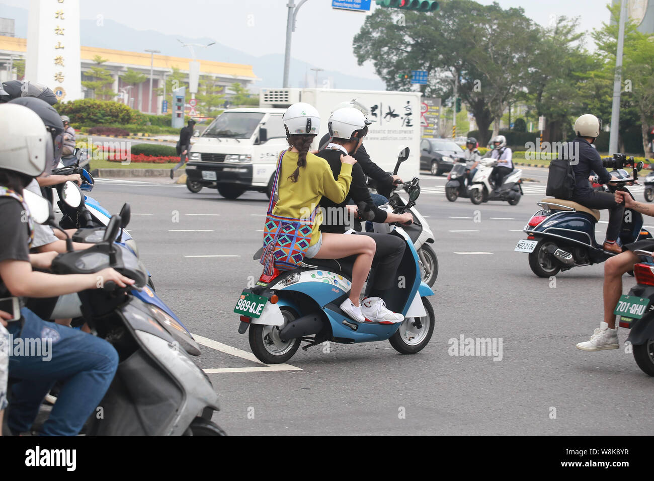 Taiwanese actor Bolin Chen, center right, and South Korean actress ...
