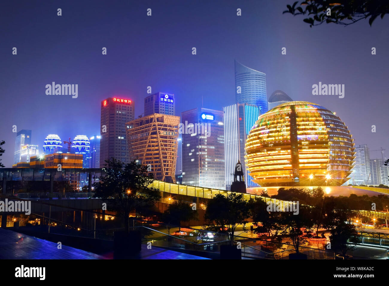 Night view of the InterContinental Hotel Hangzhou, right, and other ...