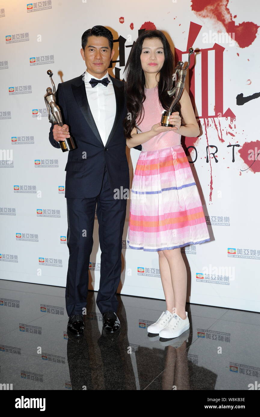 Chinese actress Jessie Li, right, and Hong Kong actor Aaron Kwok pose ...