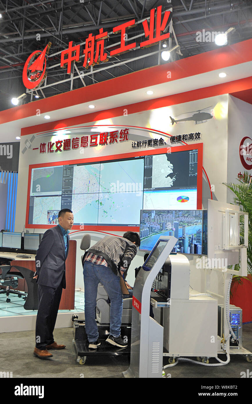 --FILE--People visit the stand of AVIC (Aviation Industry Corporation ...