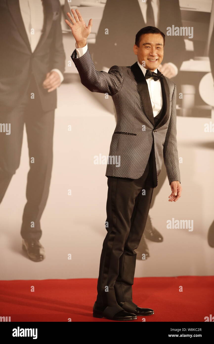 Hong Kong actor Tony Leung Ka-fai arrives on the red carpet for the presentation ceremony of the ...