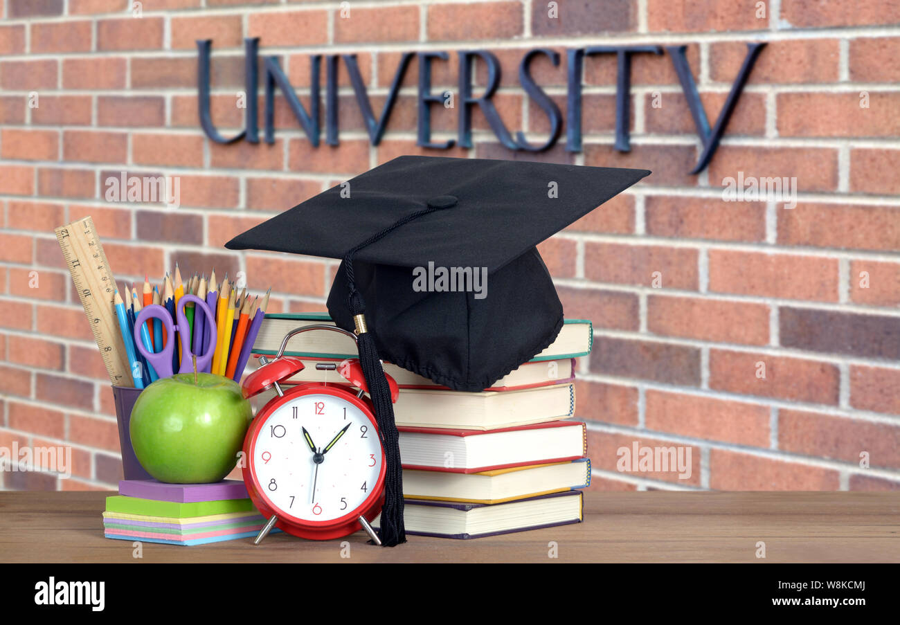 concept of education: books in the front of university Stock Photo - Alamy