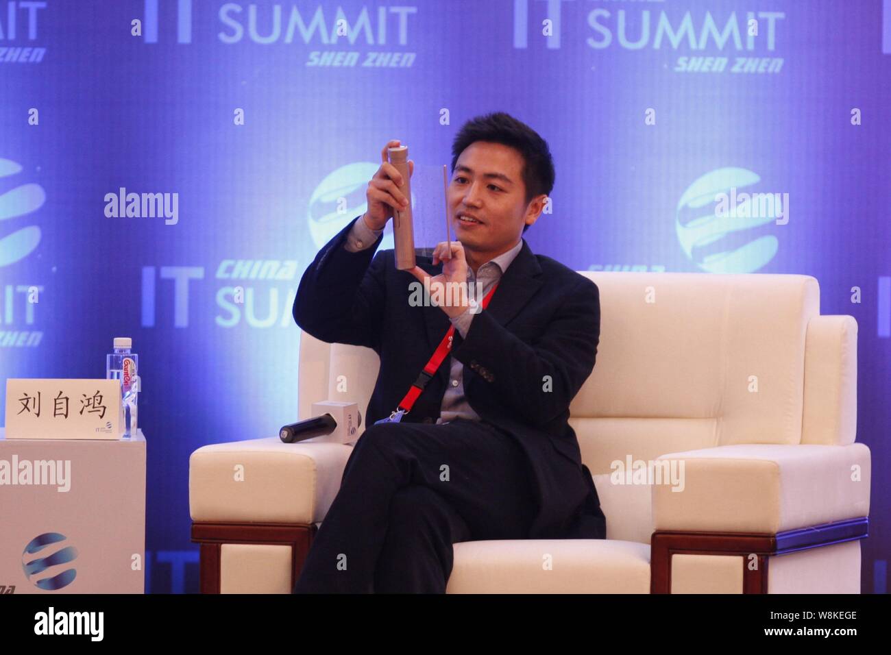 Bill Liu Zihong, CEO of Royole Corporation, shows a portable computer ...