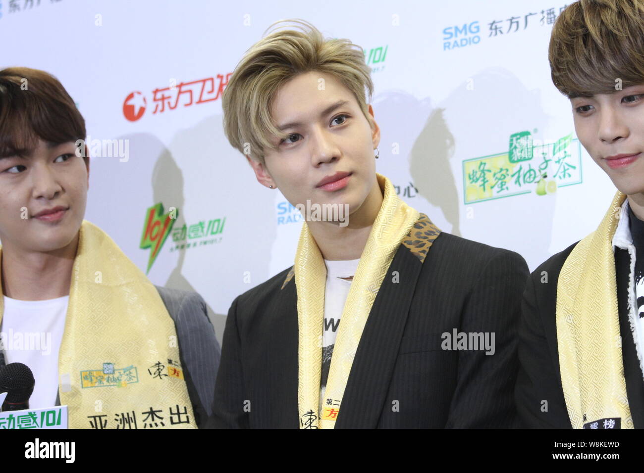 Members of South Korean boy group SHINee pose backstage during the ...