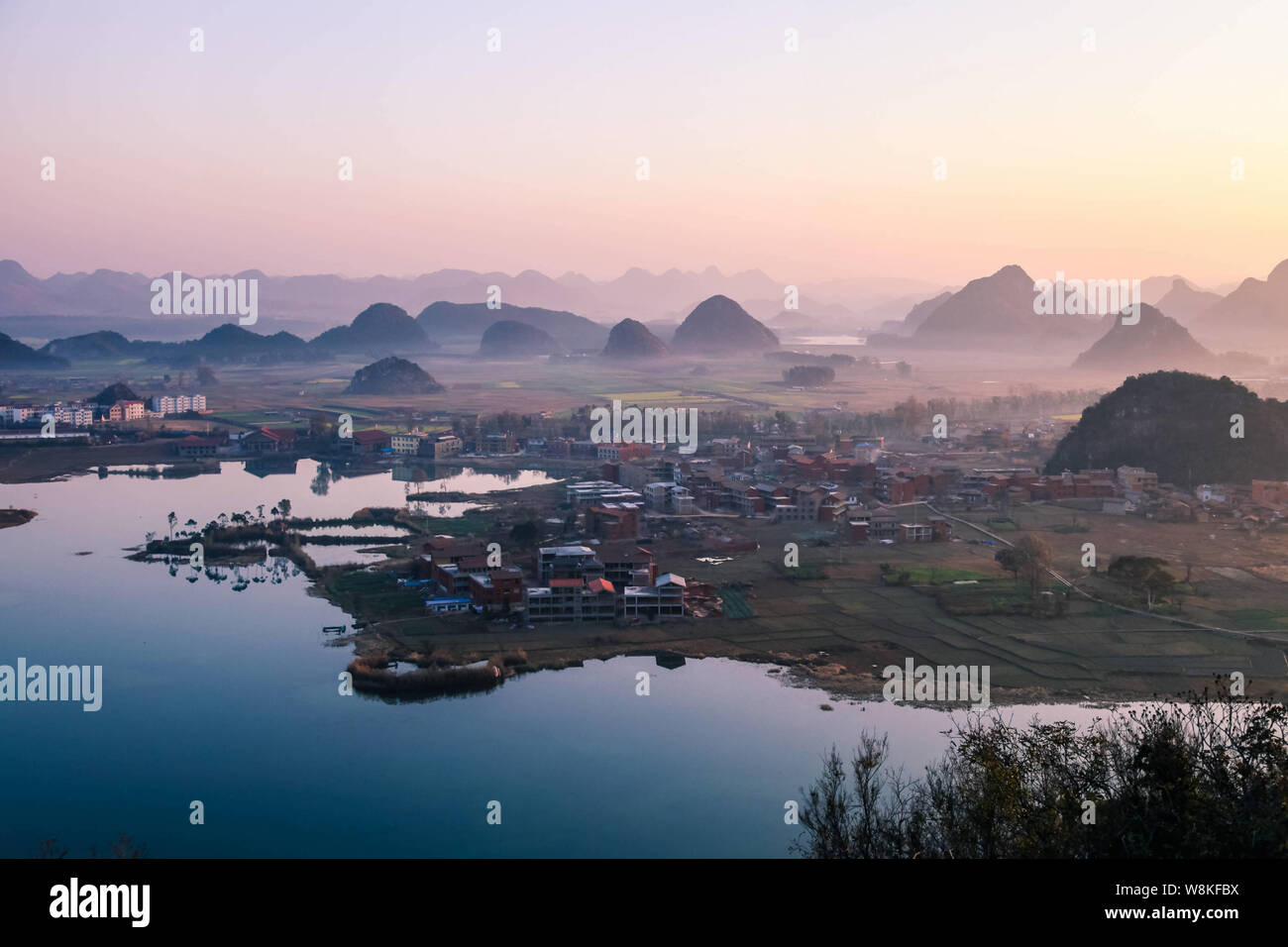 Landscape of lakes and mountain ranges in Puzhehei Scenic Area in ...