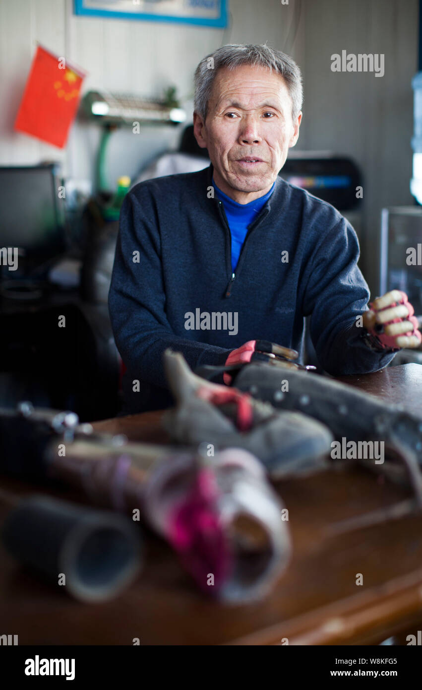 63-year-old armless farmer Sun Jifa who is equipped with his homemade ...